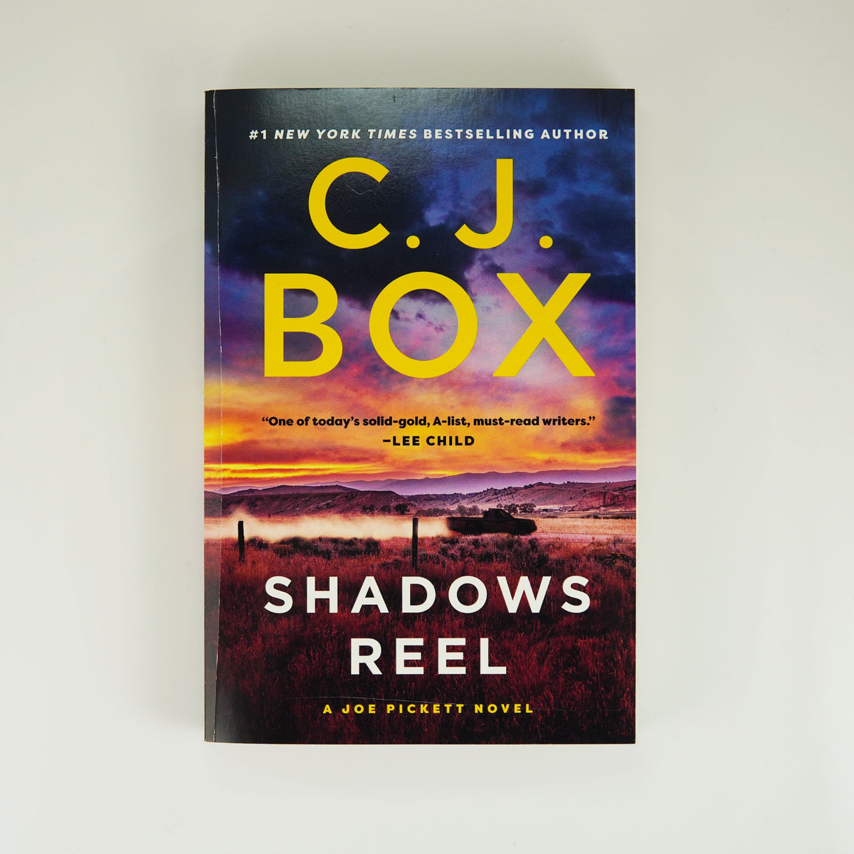 BK 13 SHADOWS REEL #22 BY C.J. BOX #16523 D2 MAR25 – Points West Market